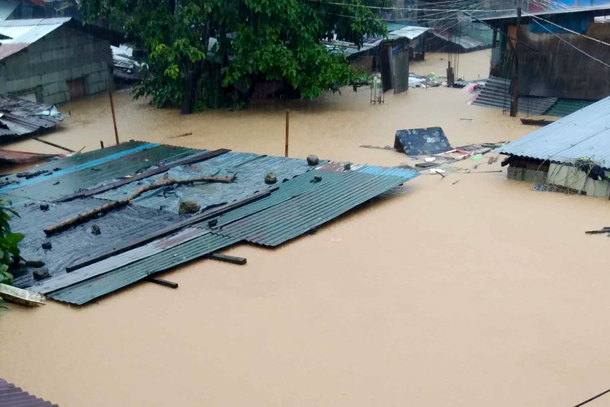 Massive floods from Typhoon Carina force families to flee their homes